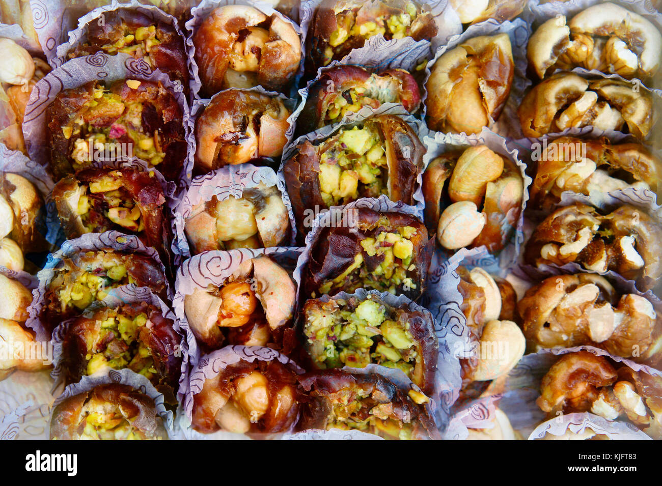 A selection of Arabic dates and nuts Stock Photo - Alamy