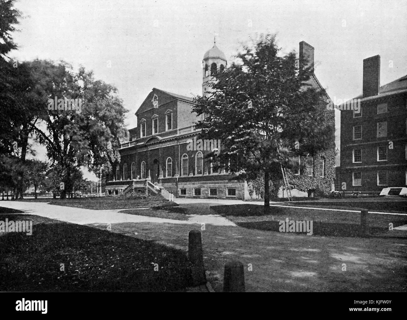 An exterior photograph of Harvard Hall at Harvard University, the ...