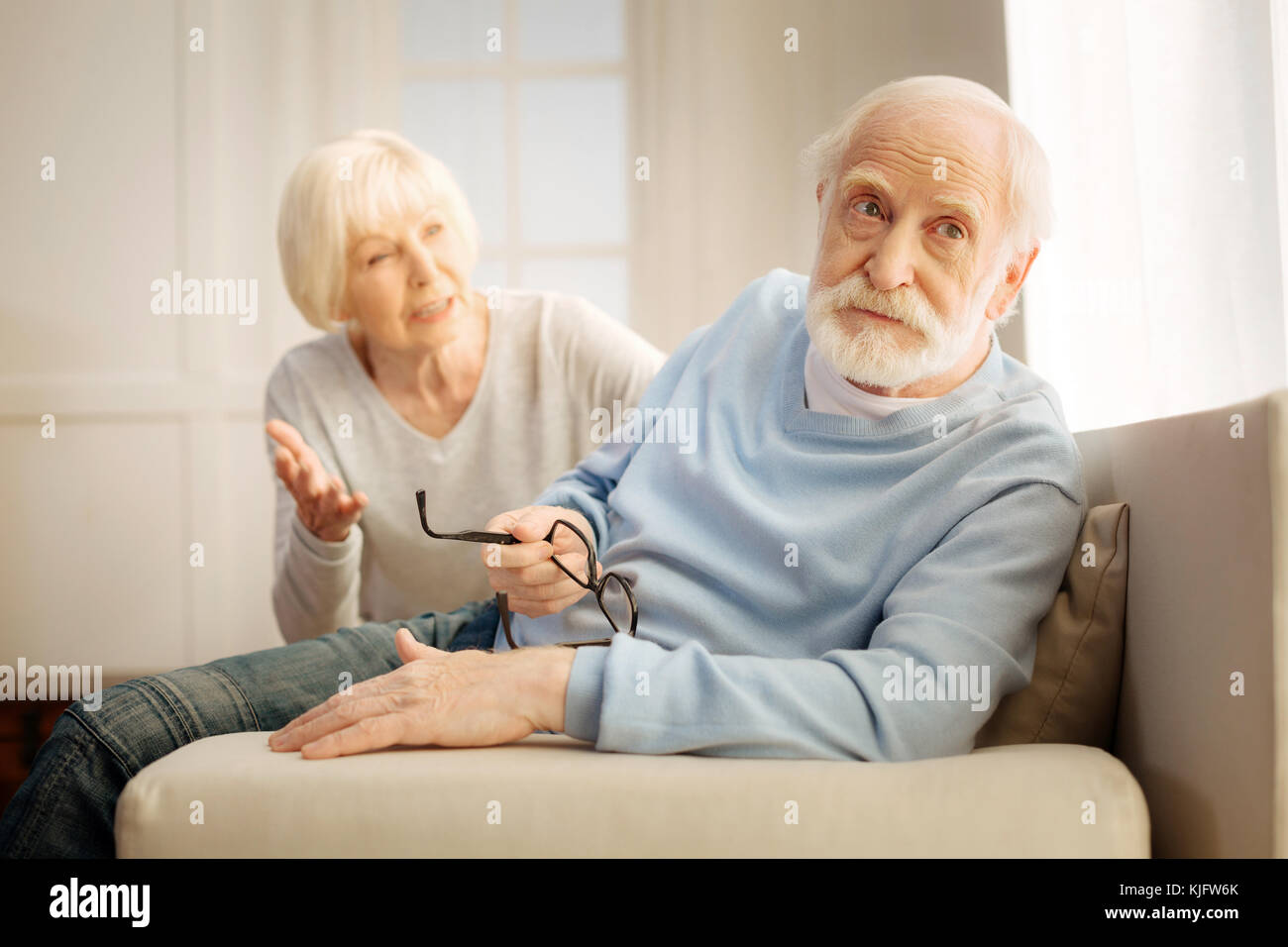 Angry man pressing his lips Stock Photo - Alamy
