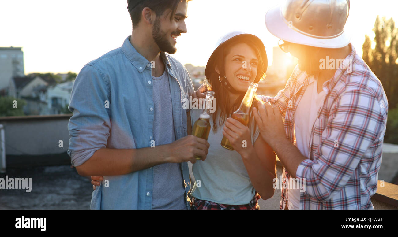Happy cheerful friends spending fun times together Stock Photo - Alamy