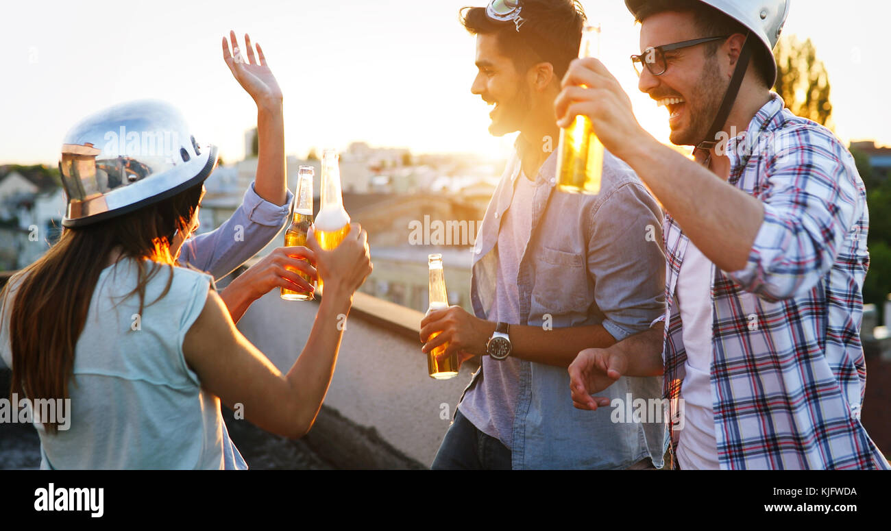 Happy cheerful friends spending fun times together Stock Photo - Alamy