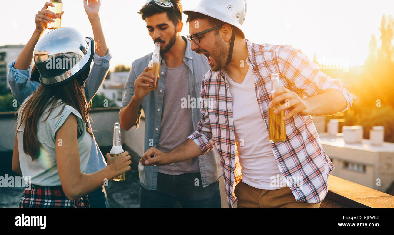 Happy cheerful friends spending fun times together Stock Photo - Alamy
