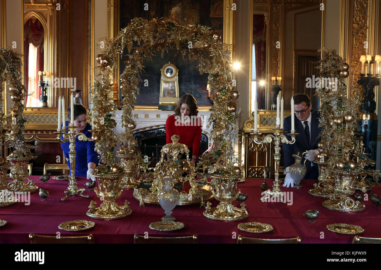 Members of Royal Collection Trust staff applys the finishing touches to ...