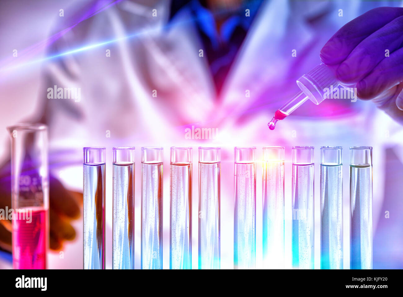 Scientist analyzing different substances in the laboratory with test ...