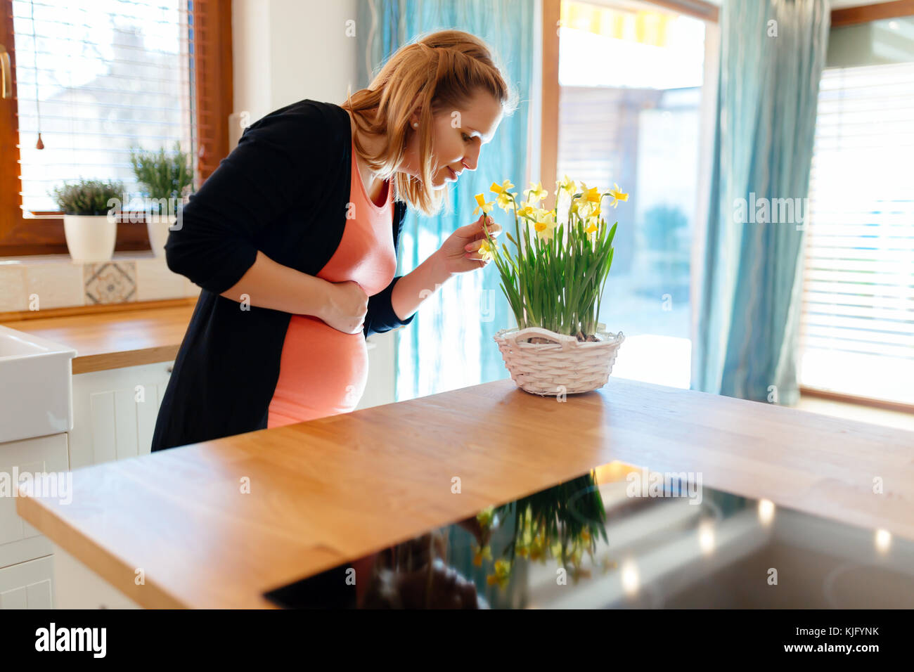 Happy pregnant woman smelling hi-res stock photography and images - Alamy