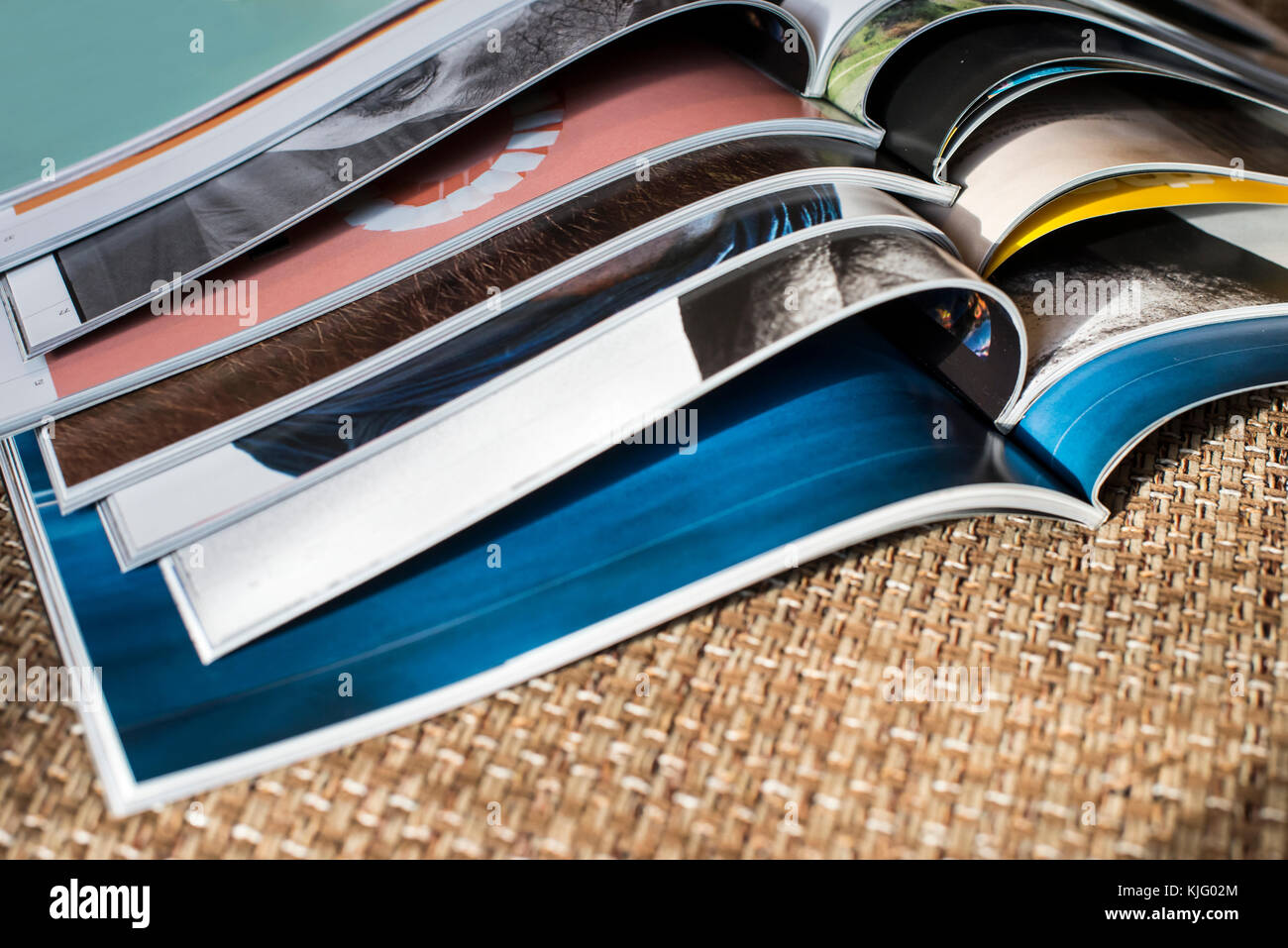 Many opened journals. Sun light Stock Photo - Alamy