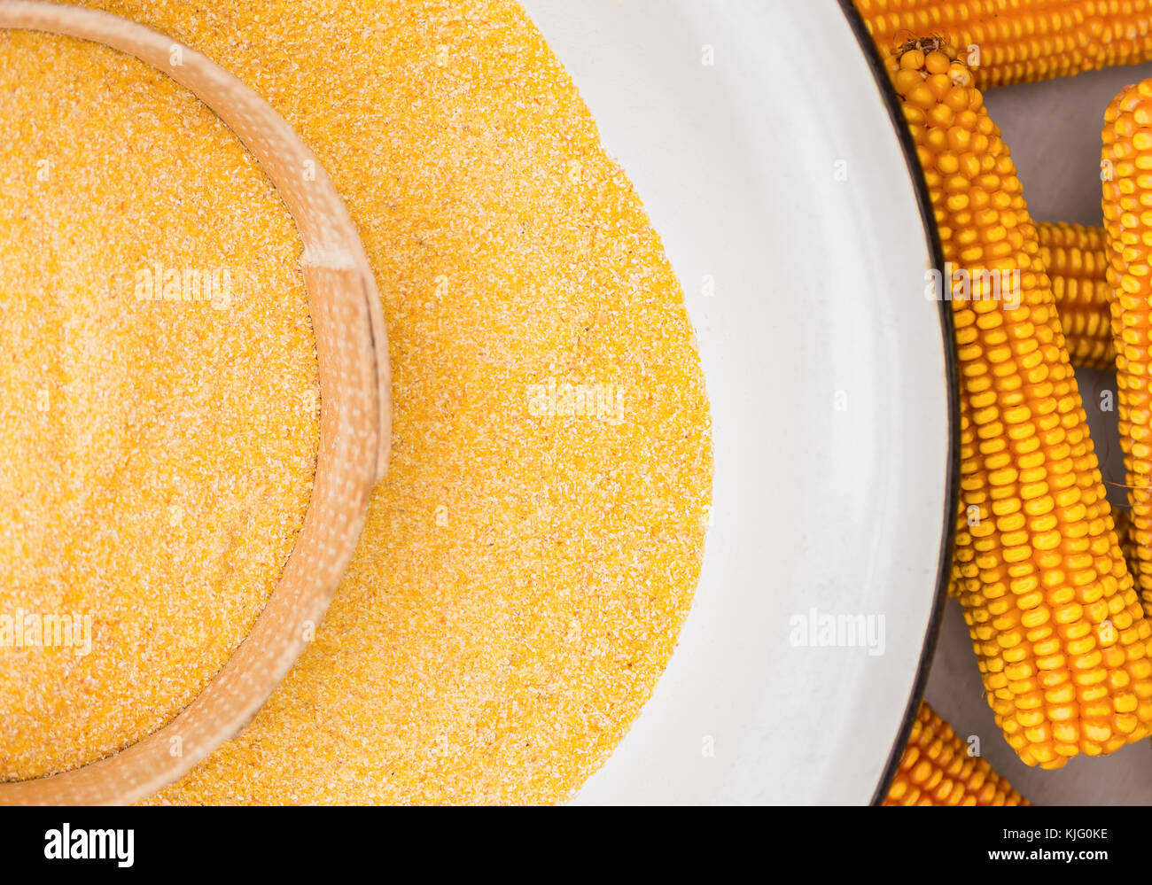 Corn sieve flour next to corn cobs. Useful for food , farmer ...
