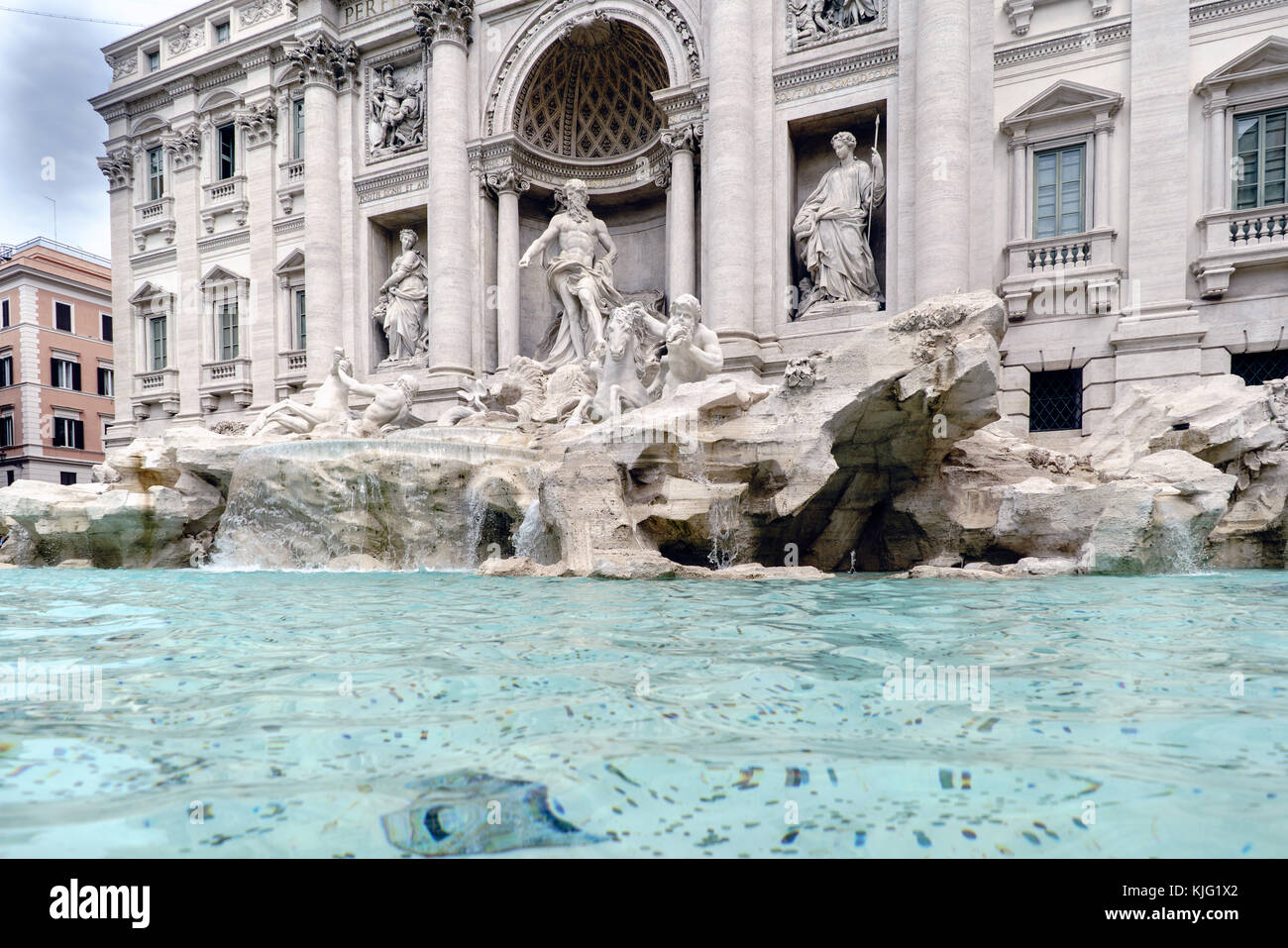 Waterfront side view of the fountain called "Fontana di Trevi", one of ...