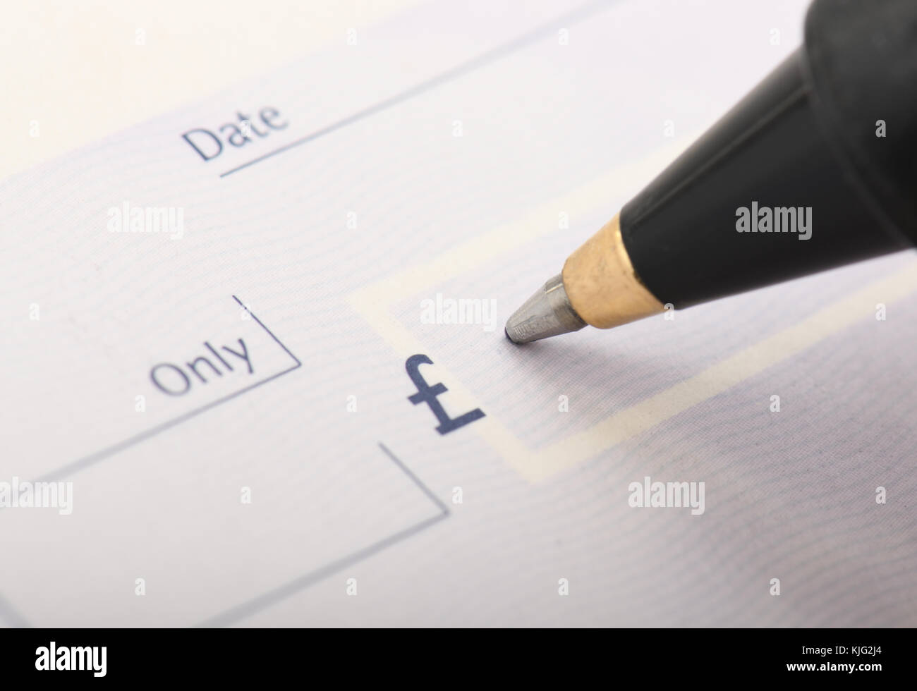 Writing a blank cheque Stock Photo - Alamy
