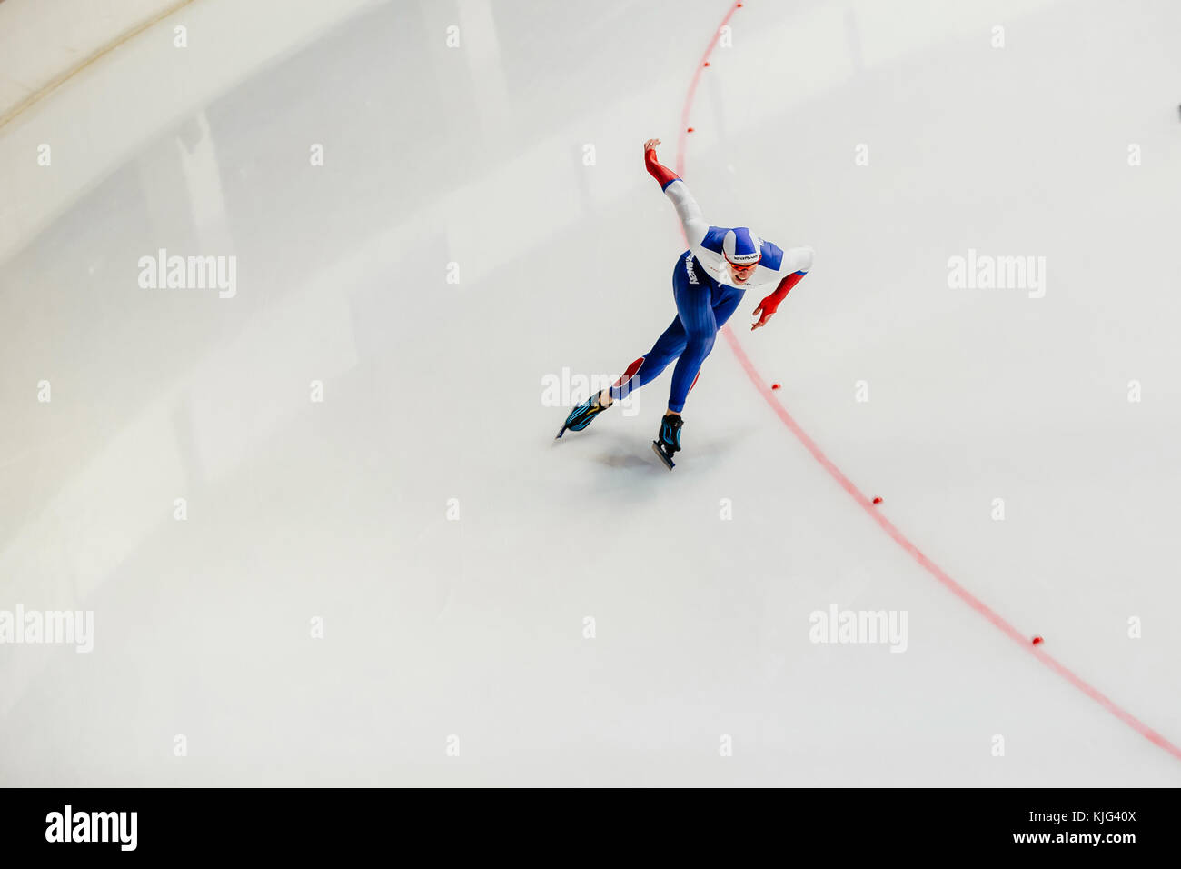 sprint race male athlete speed skater skate turn during Cup in speed ...