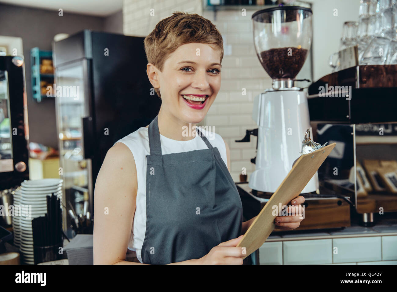 Waitress laughing at camera hi-res stock photography and images - Alamy