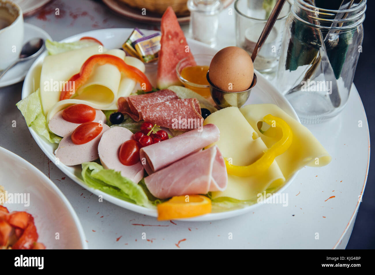 Plate with breakfast at cafe Stock Photo - Alamy