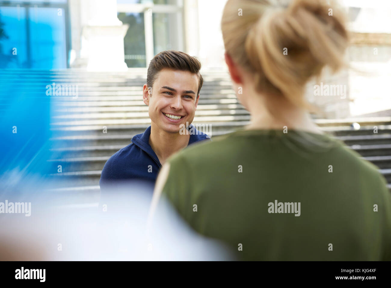 Portrait of happy young man face to face to his girlfriend Stock Photo ...