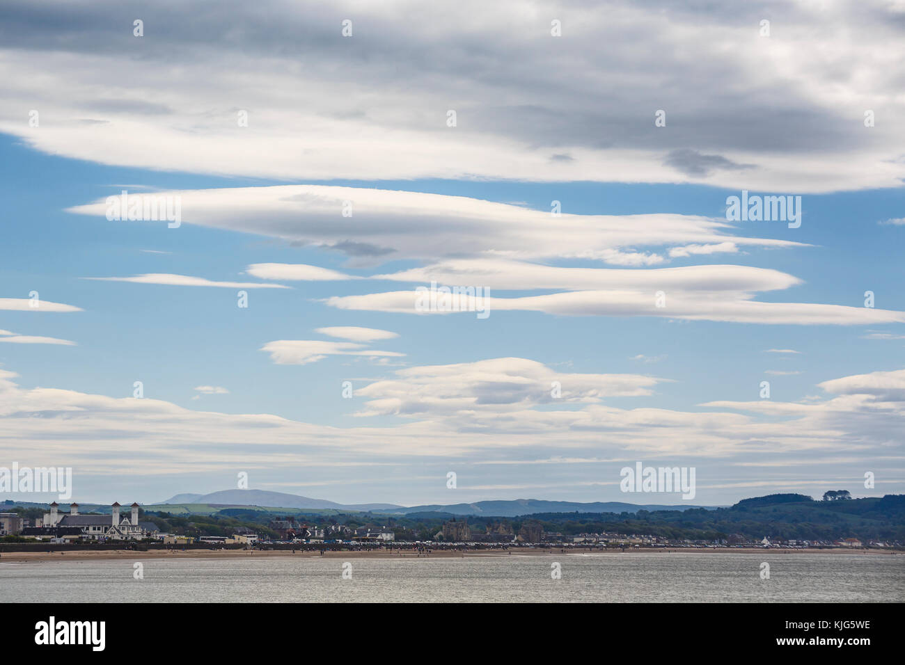 Lenticular altocumulus clouds over the coastal town of Ayr in Scotland ...