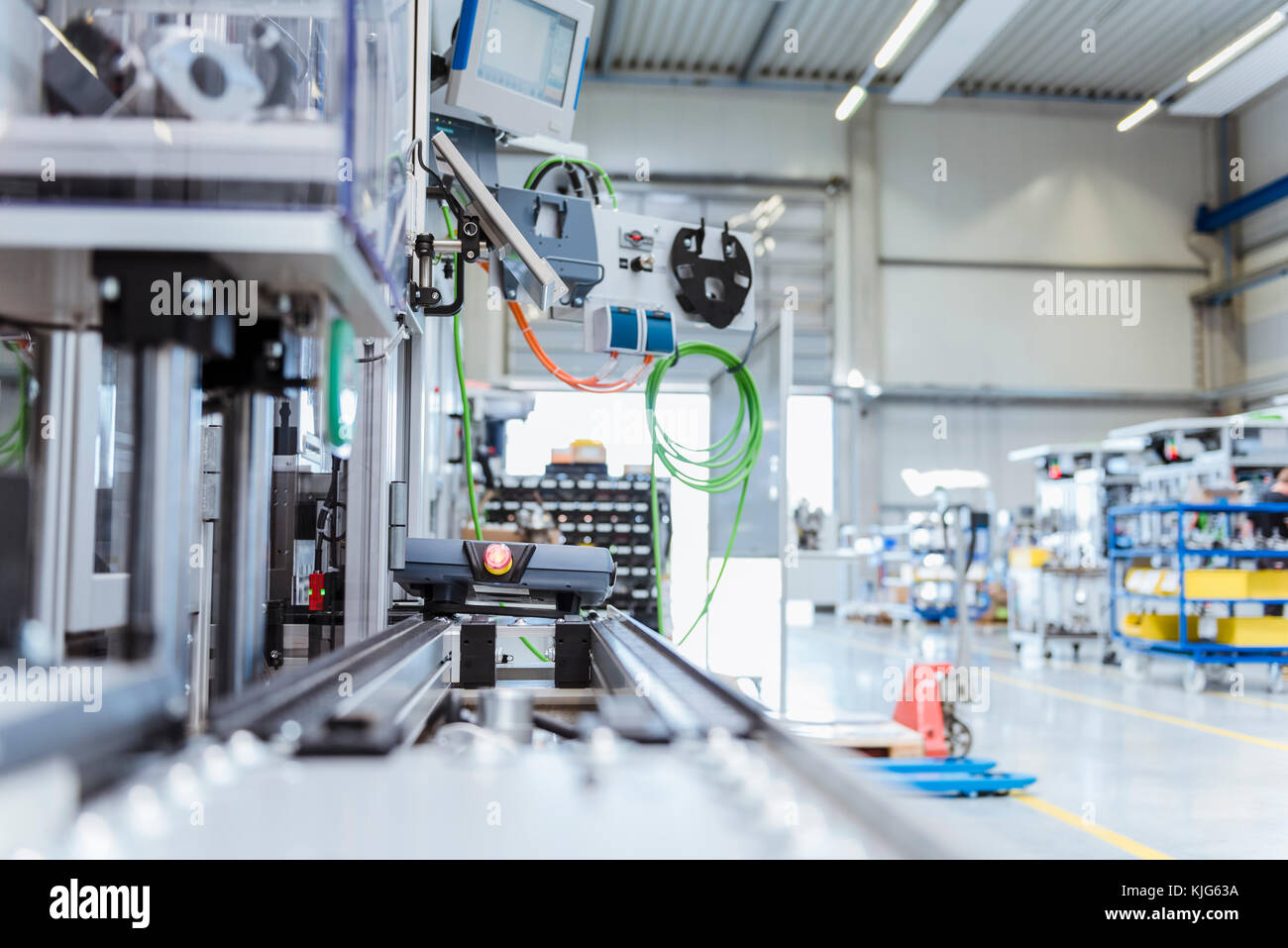 Machine on factory shop floor Stock Photo - Alamy