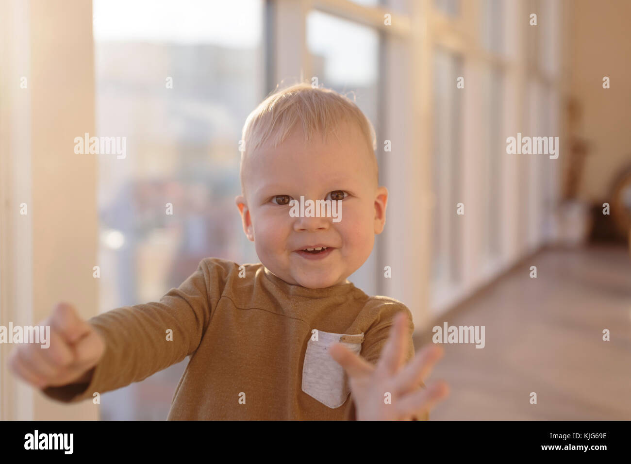 Toddler arms outstretched hi-res stock photography and images - Alamy