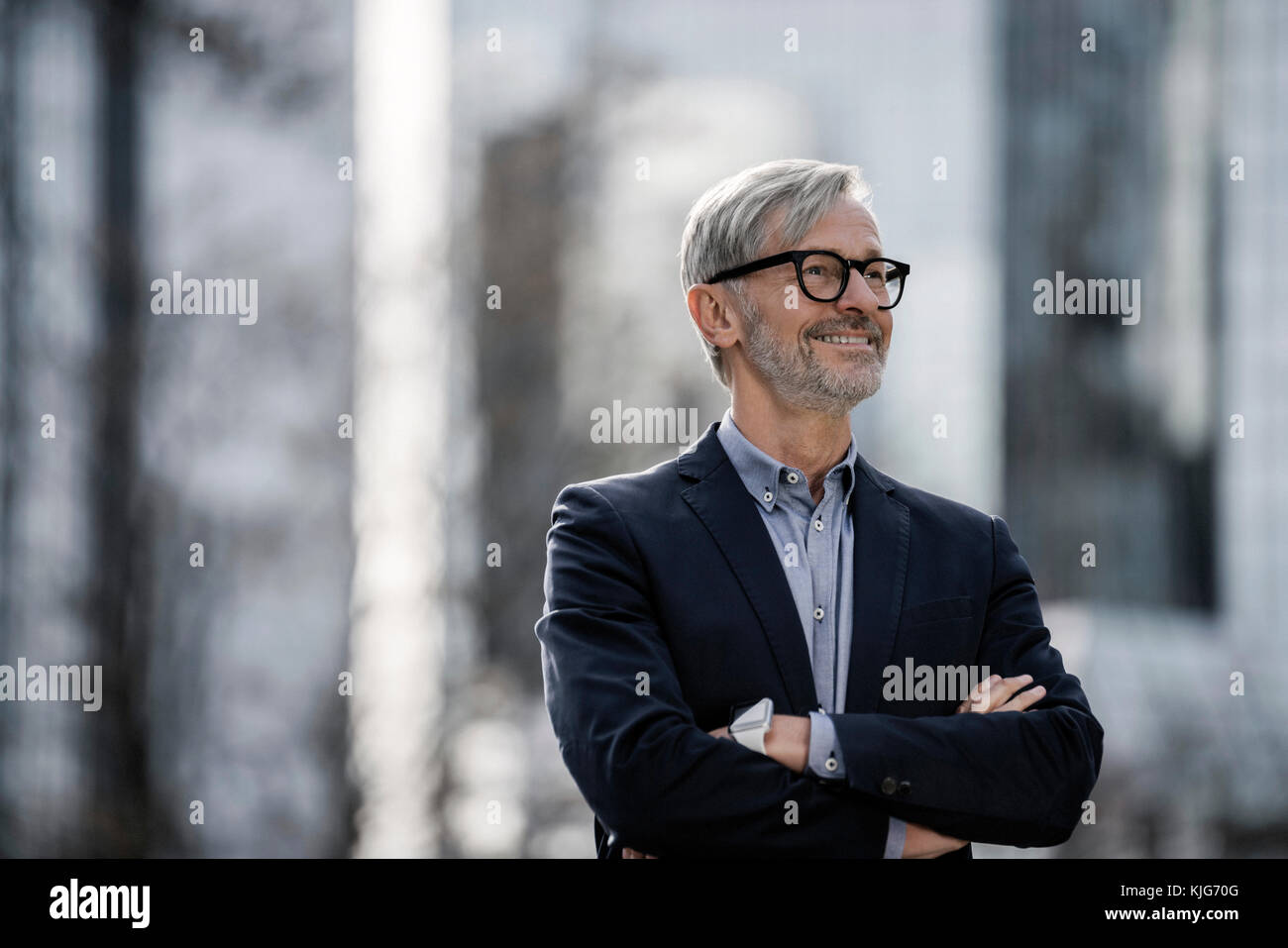 Smiling grey-haired businessman outdoors Stock Photo - Alamy