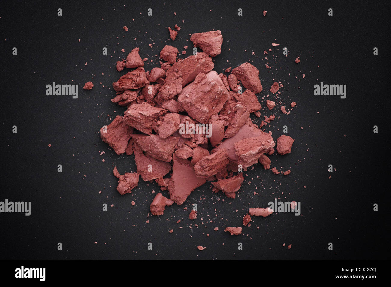 Dry Red Clay Heap. Black background. Close up Stock Photo - Alamy