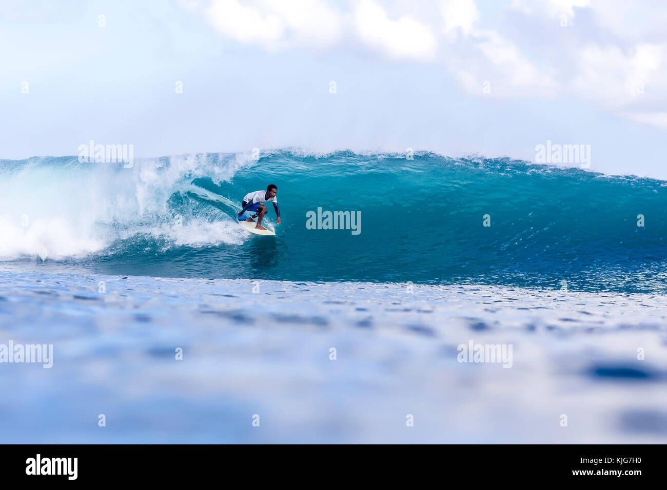 Indonesia, Bali, man surfing Stock Photo - Alamy