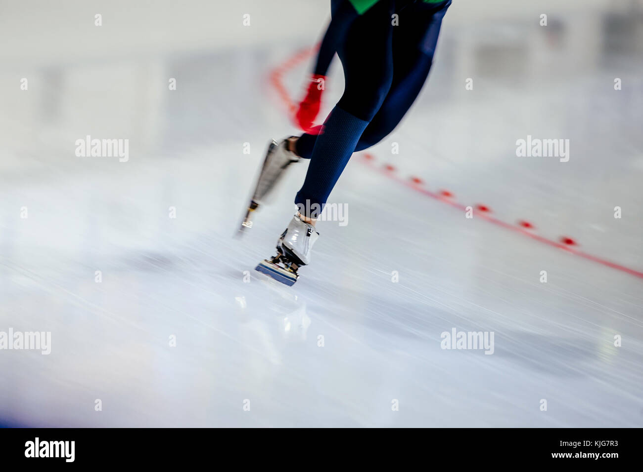 woman legs athlete speed skater blurred motion Stock Photo - Alamy