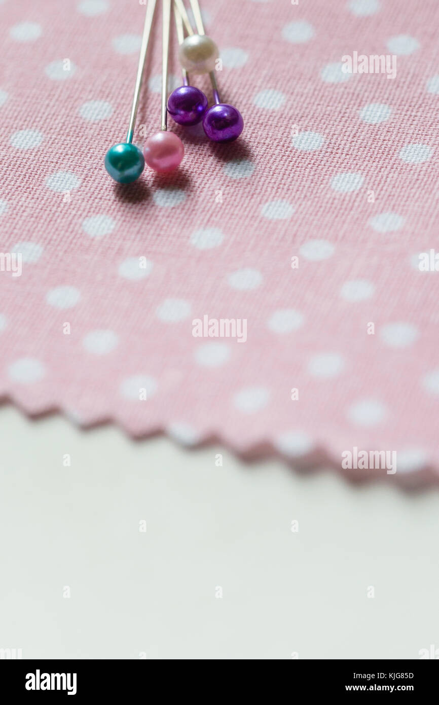 Fixing pins on cloth Stock Photo - Alamy