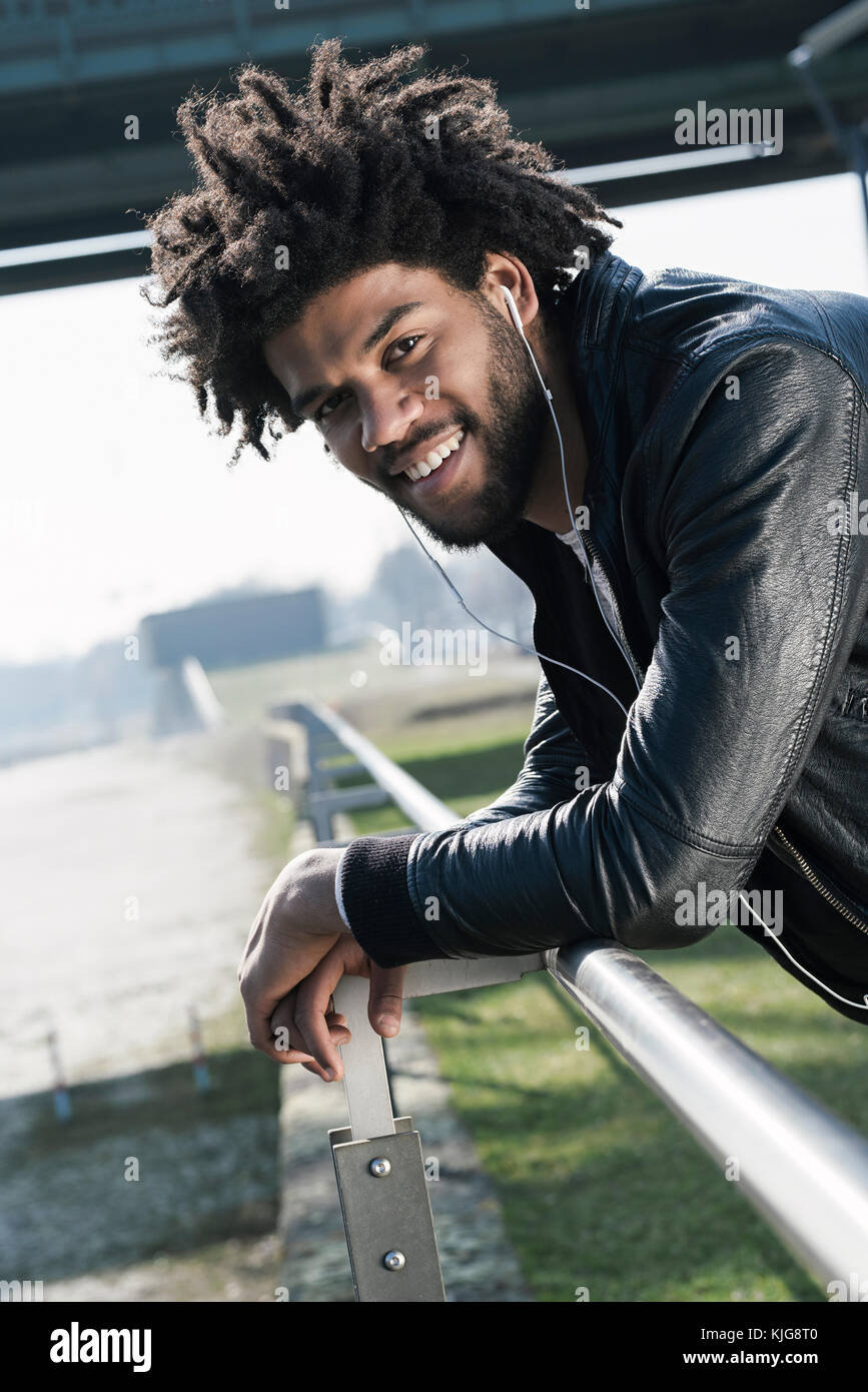 Man leaning on hand rail hi-res stock photography and images - Alamy