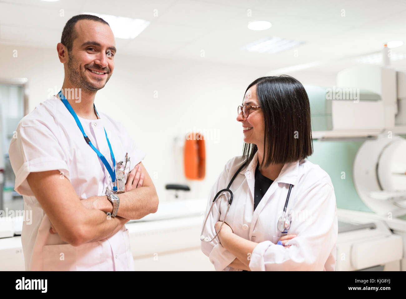 Portrait of two smiling doctors Stock Photo - Alamy