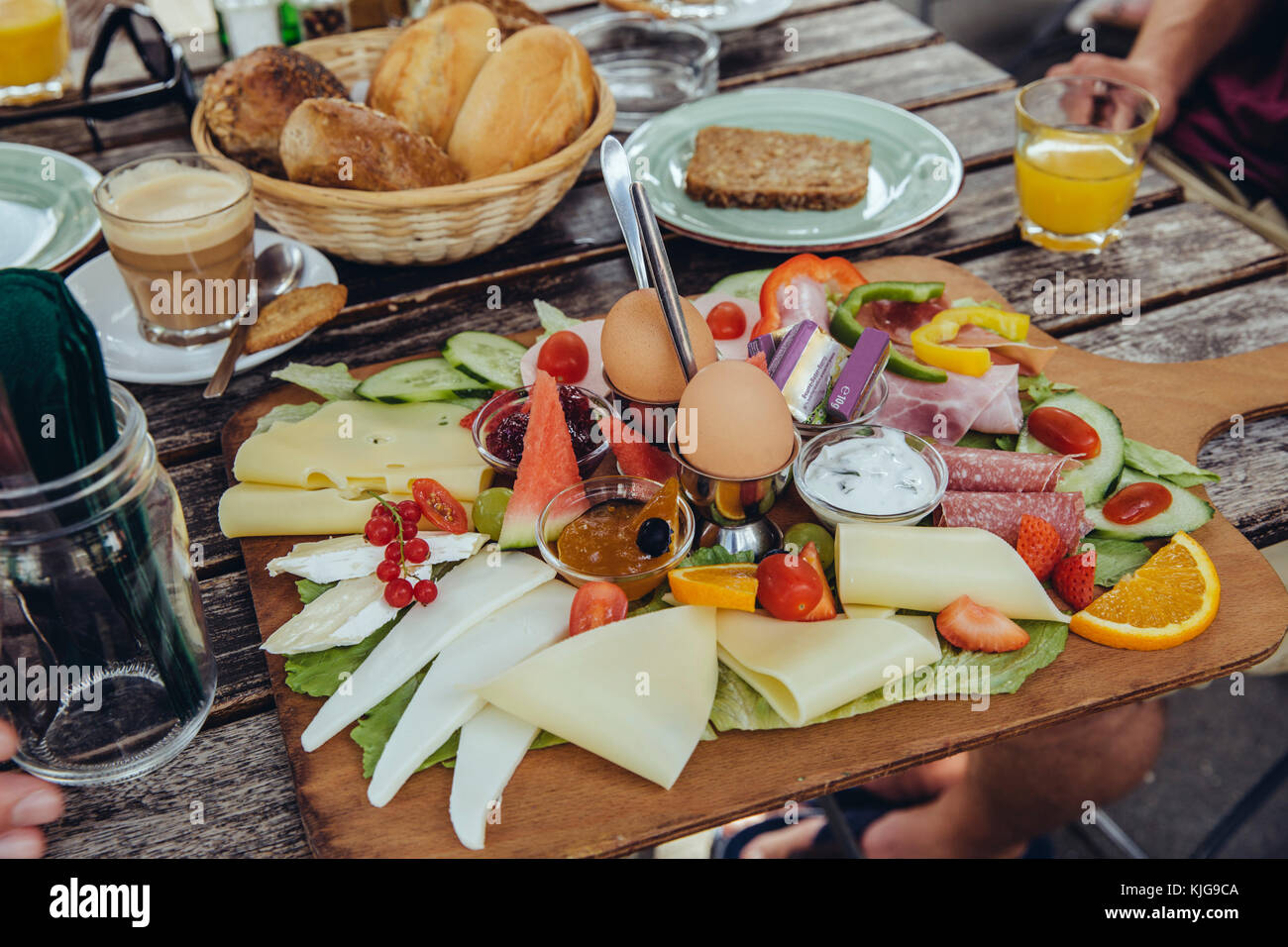 Plate with breakfast for two at cafe Stock Photo - Alamy