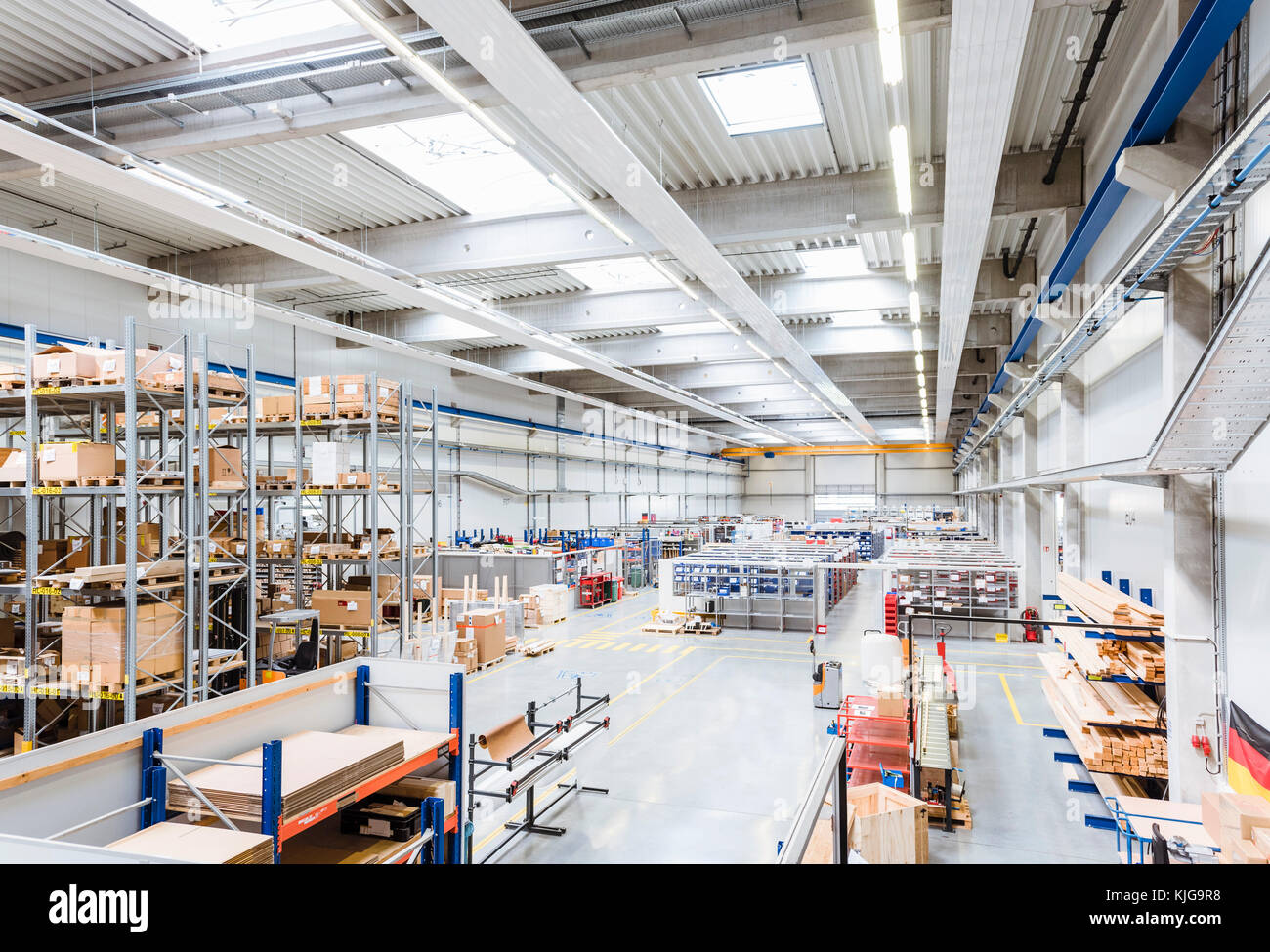 Factory shop floor with warehouse Stock Photo - Alamy