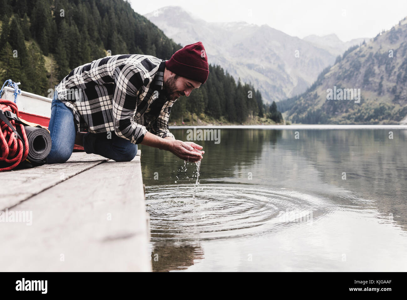 Scooping water hi-res stock photography and images - Alamy