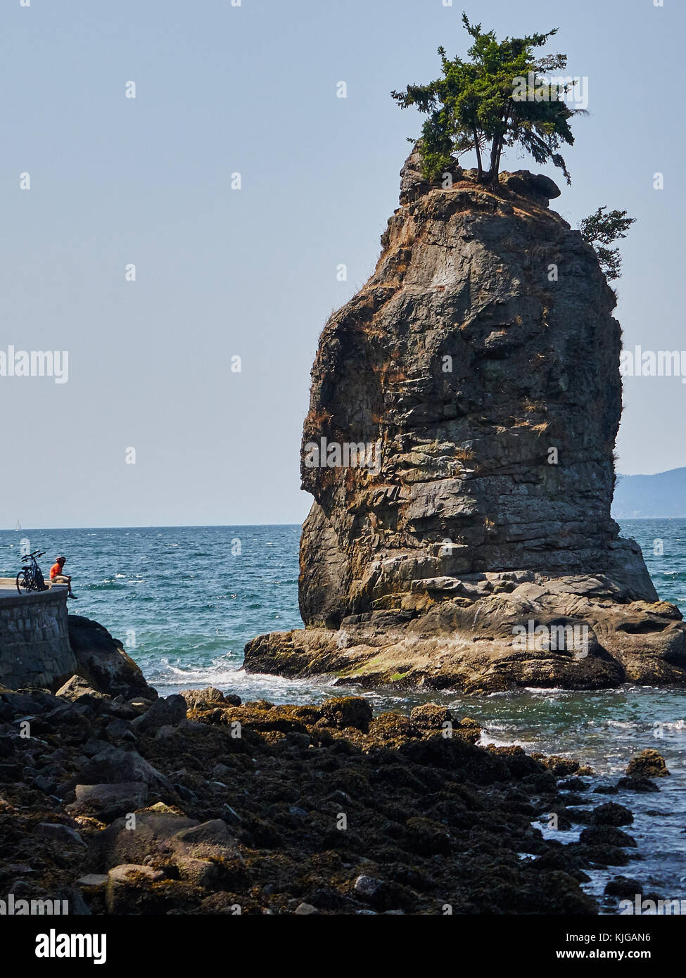 famous Siwash Rock, along the seawall in Stanley Park, Vancouver, BC ...