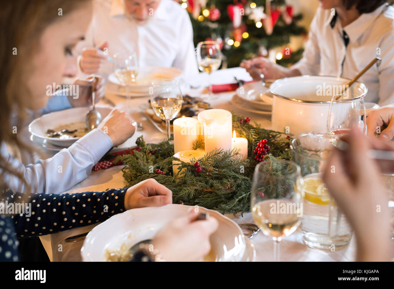 Family dining at Christmas dinner table Stock Photo - Alamy