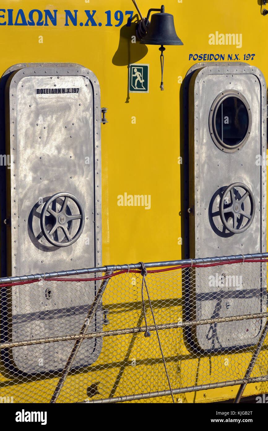 two nautical designed doors with wheels for locks and maritime themed ...