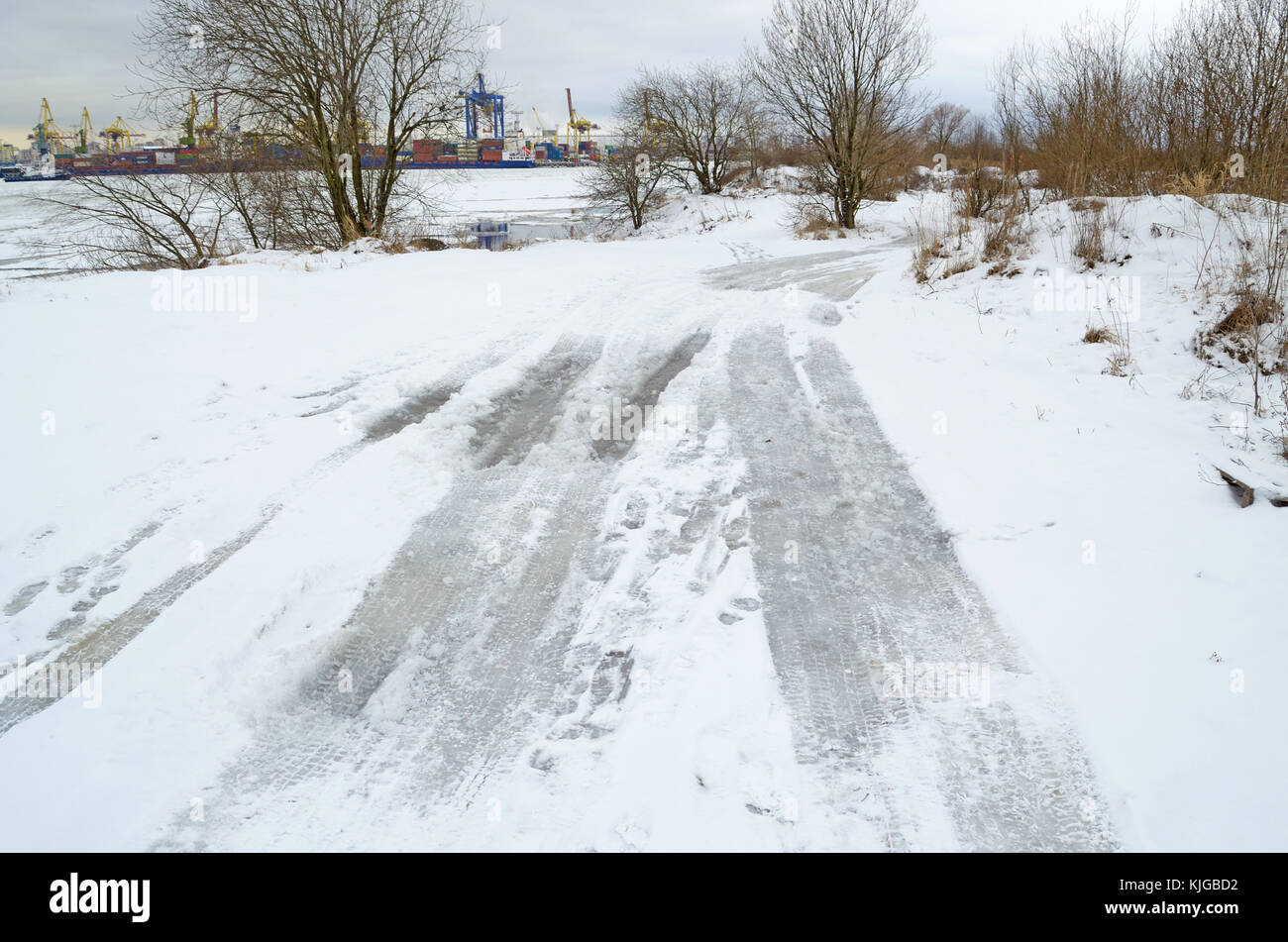Winter snowy landscape with a road in the countryside Stock Photo - Alamy