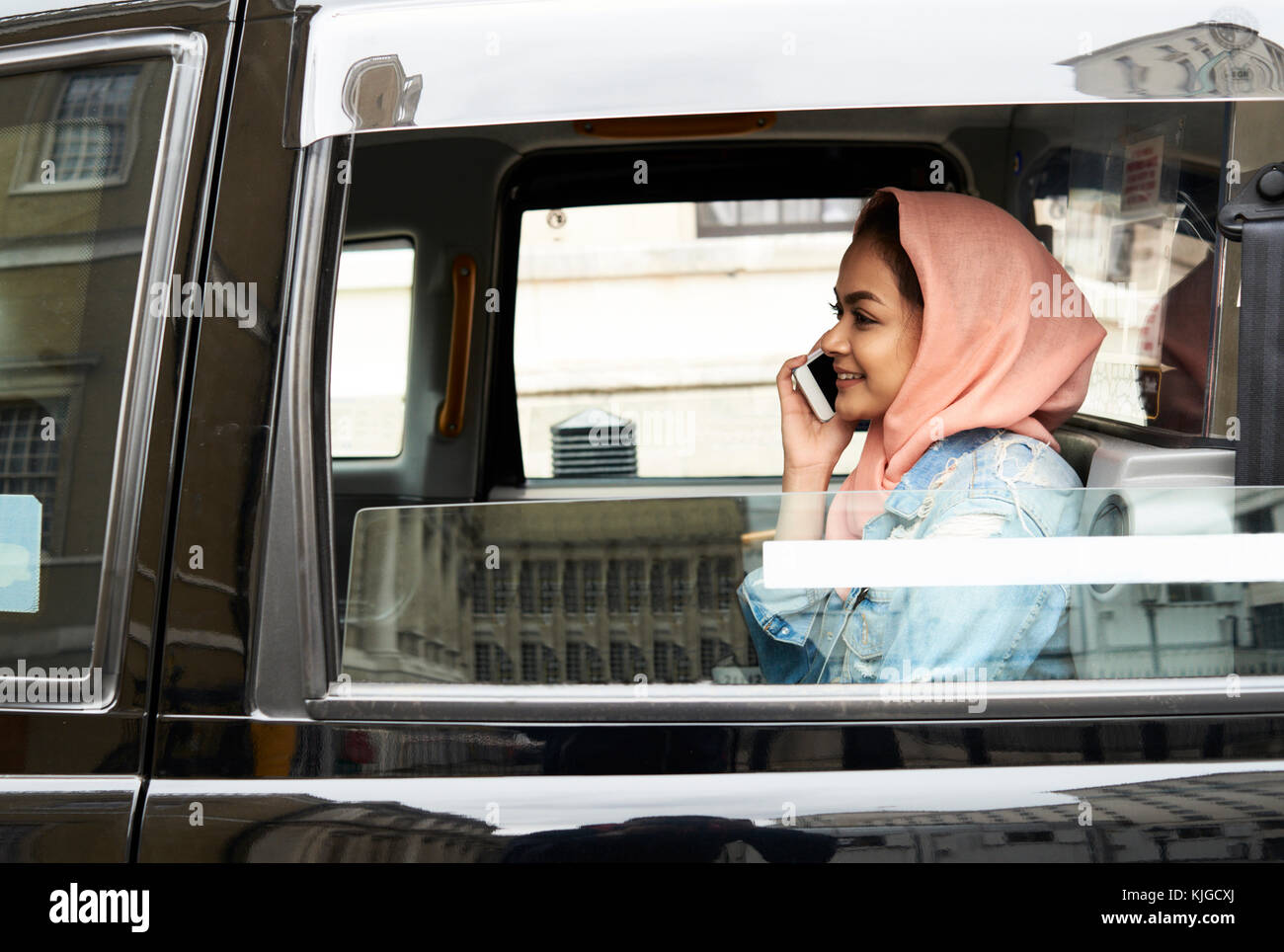 London, UK, England, Young student muslim girl wearing hijab talking ...