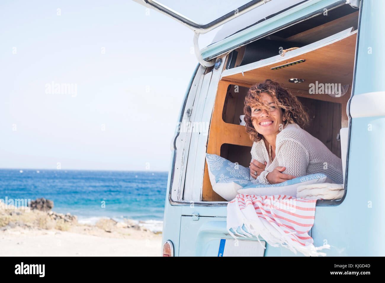 Portrait of laughing woman in van hi-res stock photography and images ...