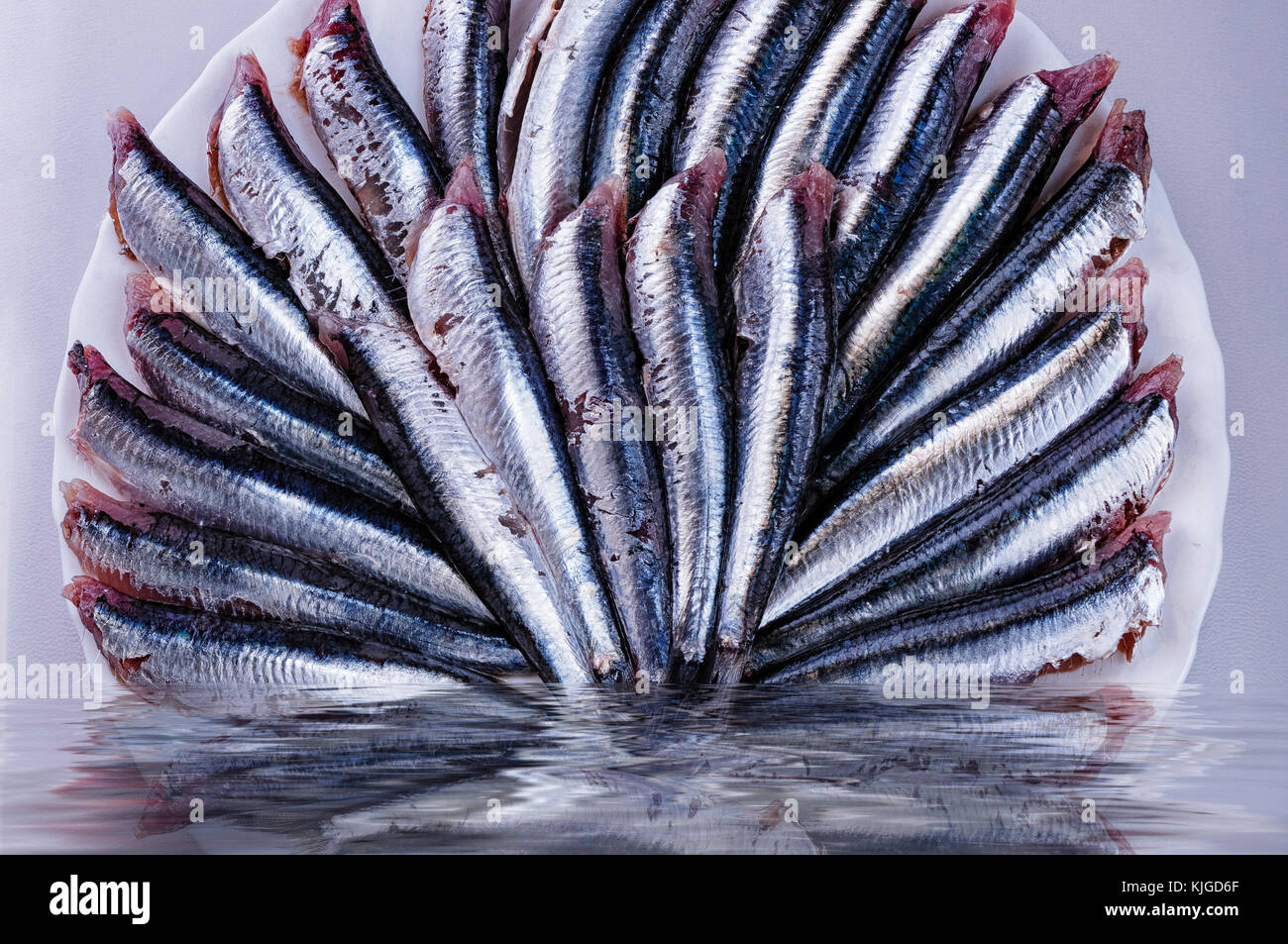 Plate with raw spanish boquerones, anchovies typical in Spain Stock ...