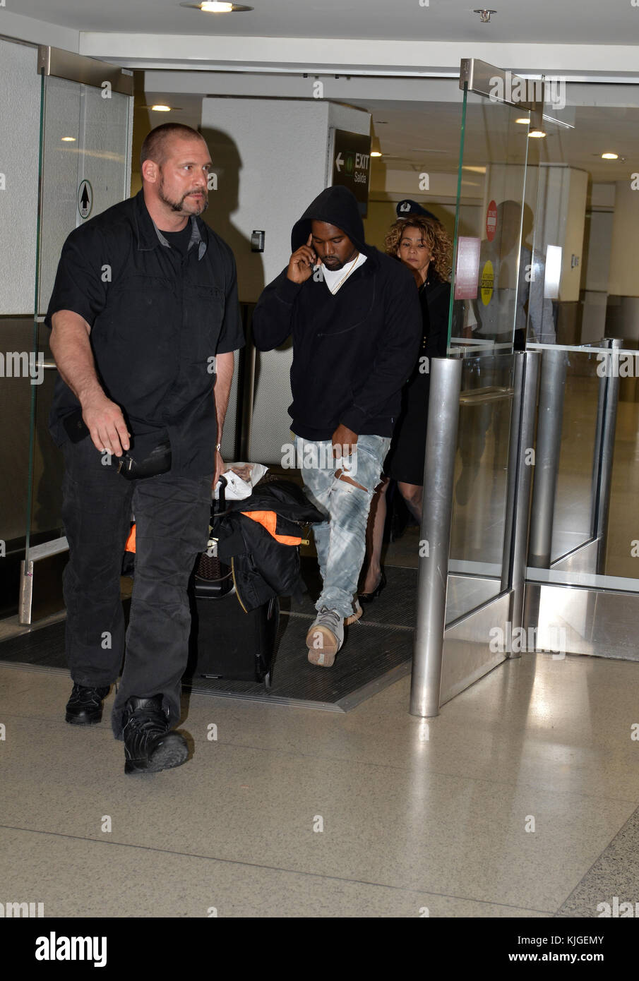 MIAMI, FL - APRIL 22: Kanye West arrives at Miami International Airport ...