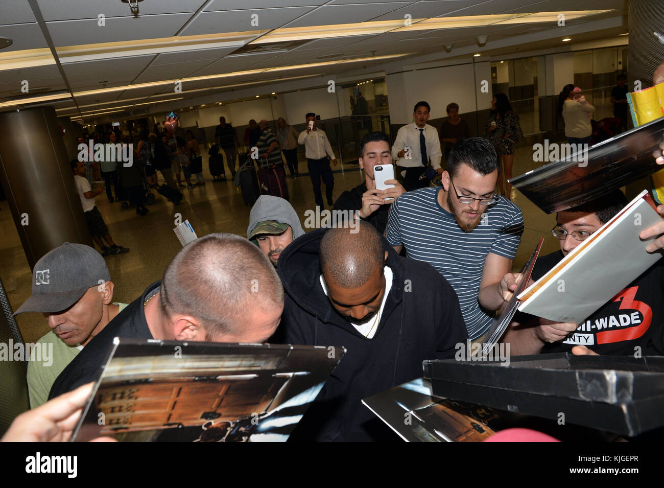 MIAMI, FL - APRIL 22: Kanye West arrives at Miami International Airport ...