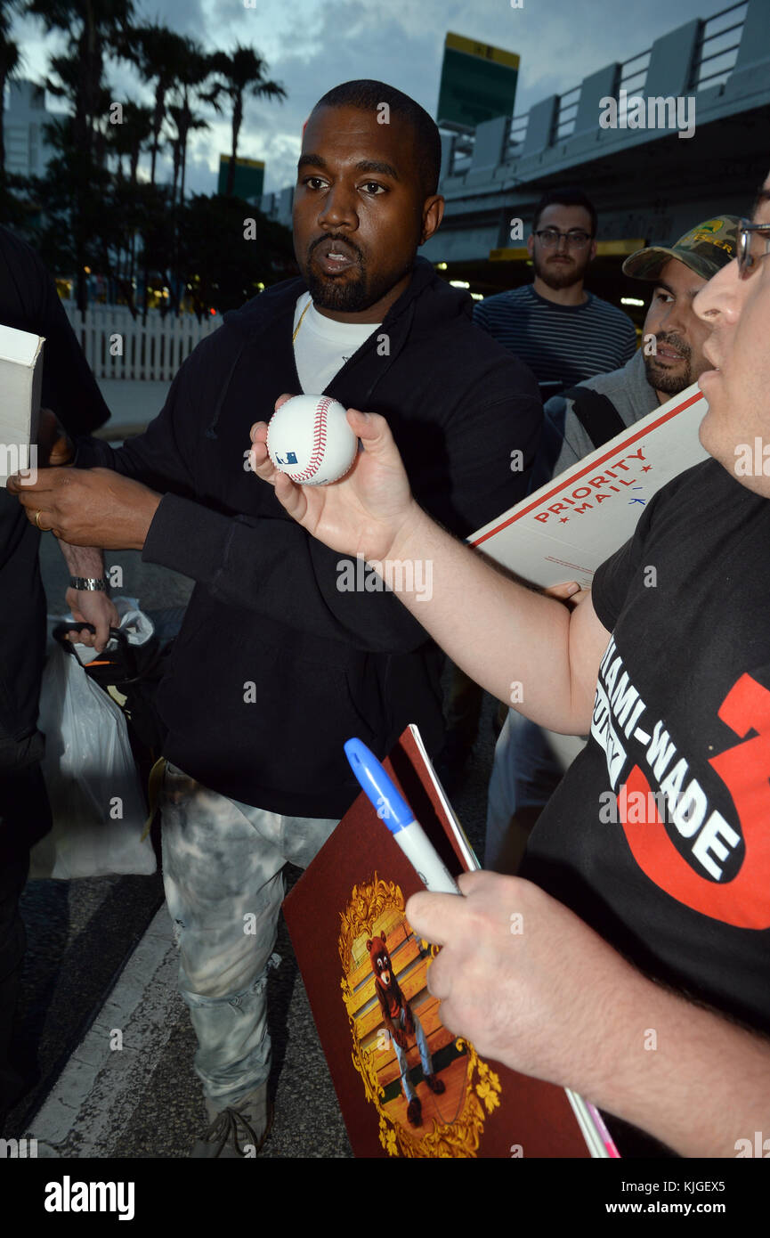 MIAMI, FL - APRIL 22: Kanye West arrives at Miami International Airport ...