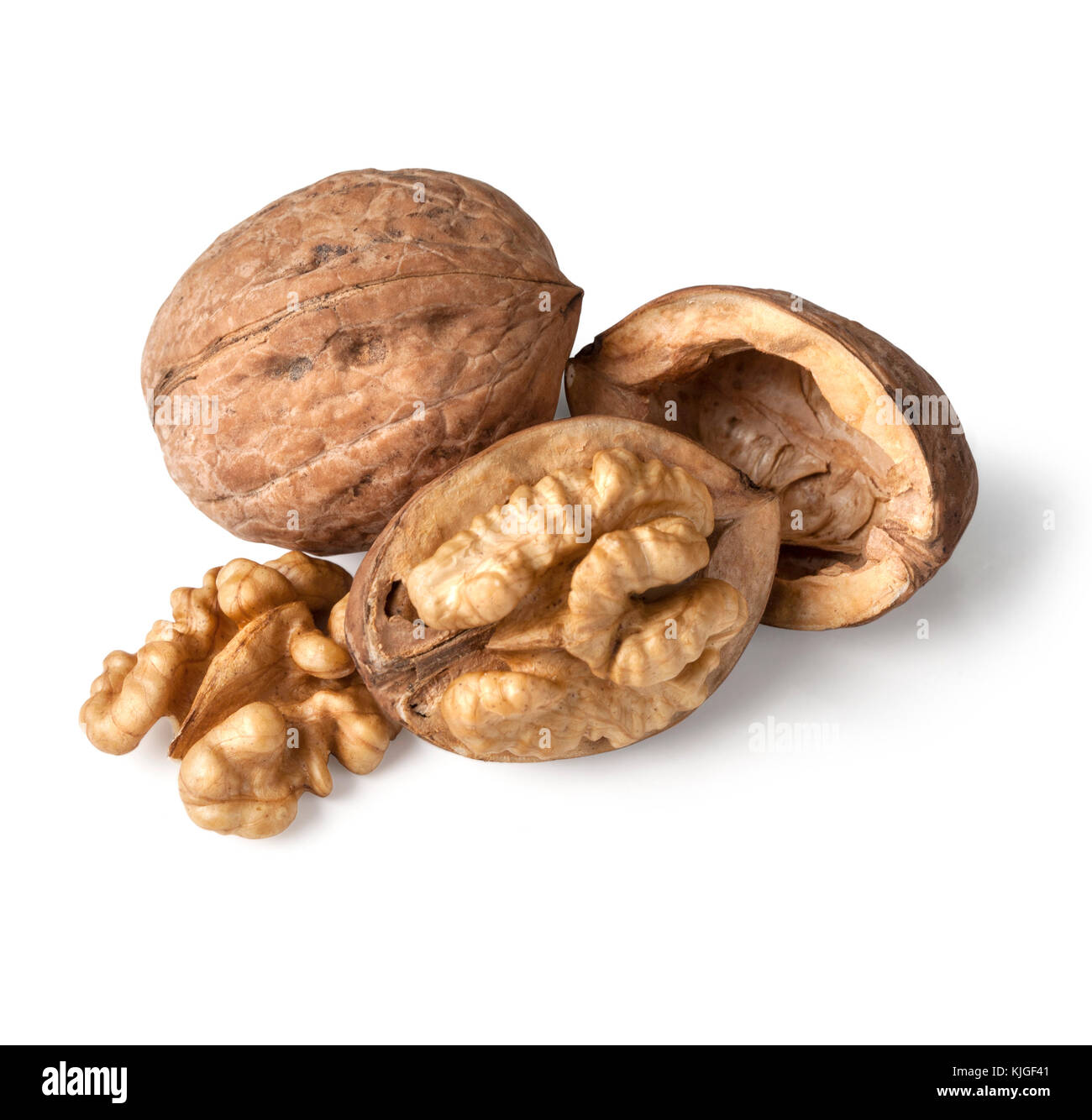 walnut and a cracked walnut isolated on the white background. with ...