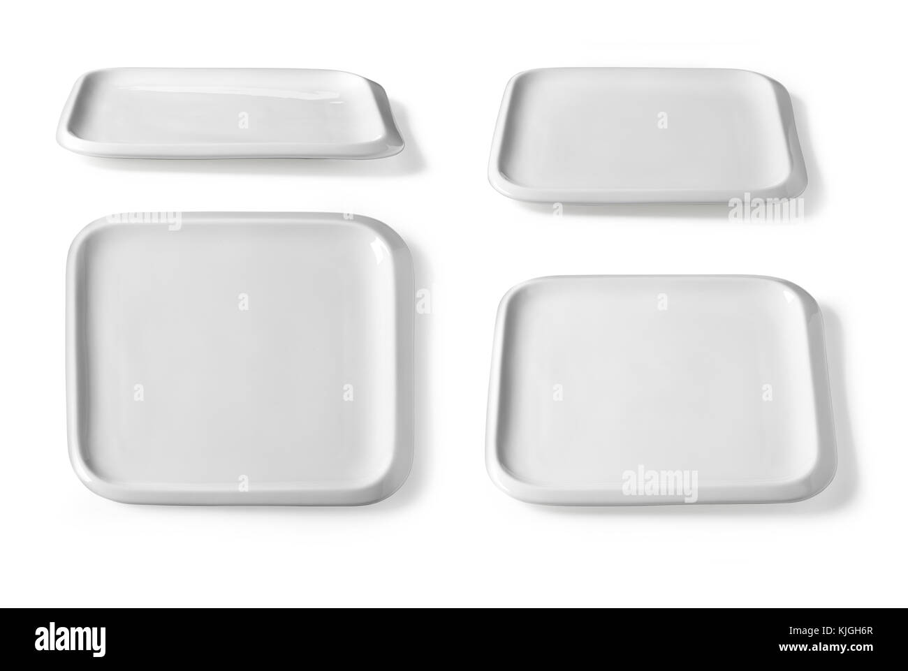 set of empty white plate on the white background Stock Photo - Alamy