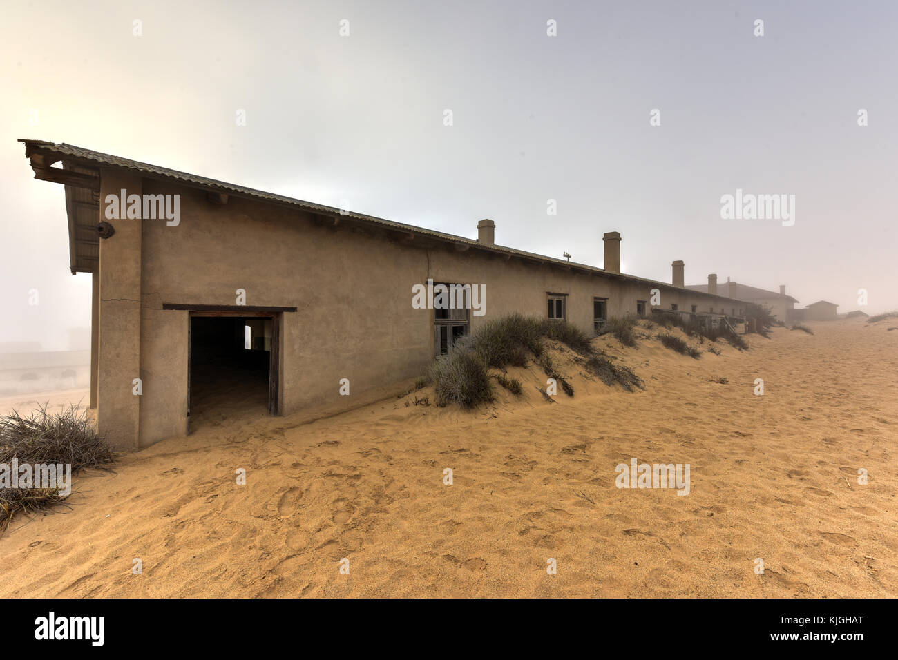 The abandoned ghost diamond town of Kolmanskop in Namibia, which is ...
