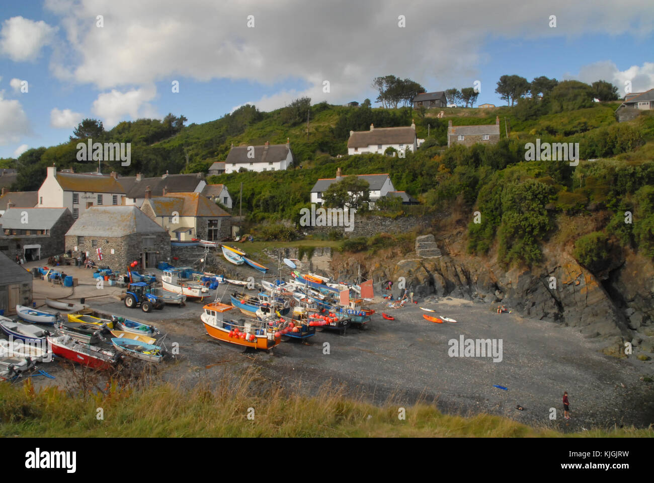 Fishing boats in Cadgwith cove, Cornwall, United Kingdom Stock Photo ...