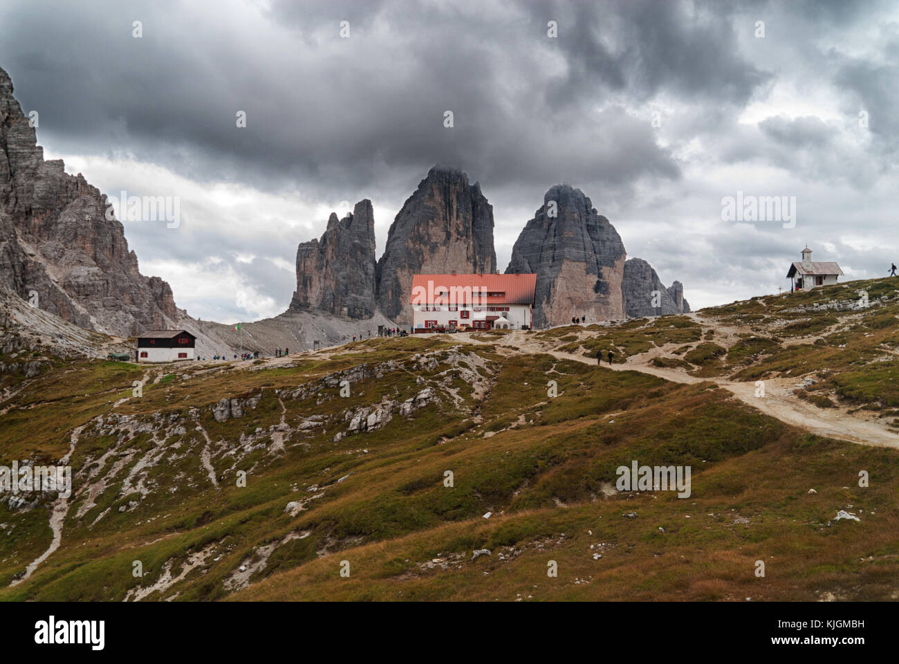 Rifugio Locatelli and chapel in front of Mount Paterno and cloud ...