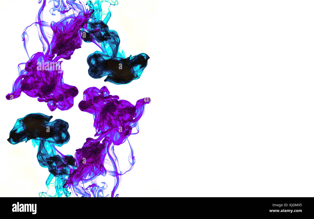 Color drop in water photographed in motion. Cloud of colorful ink in ...