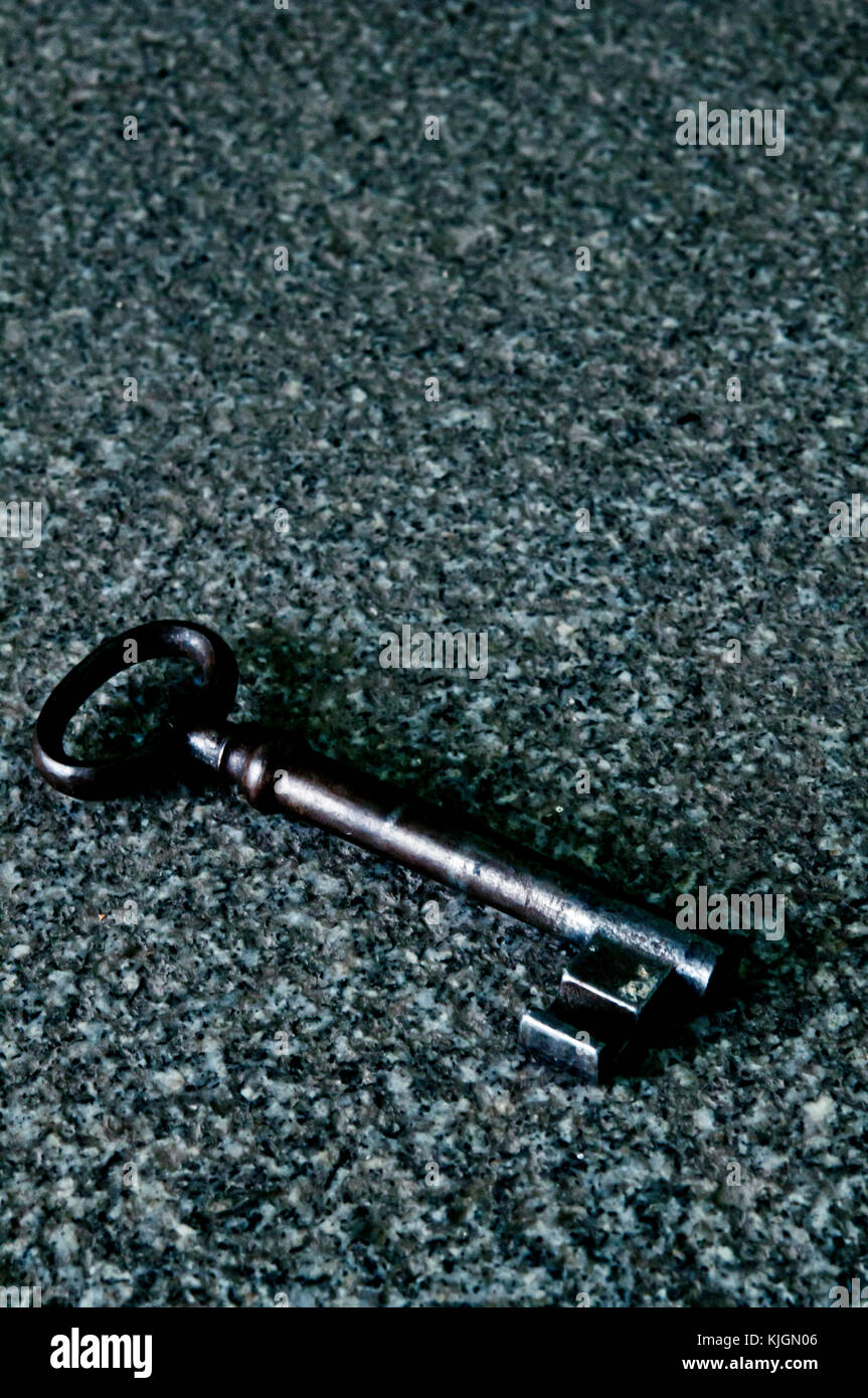 old bit key lying on the floor Stock Photo - Alamy