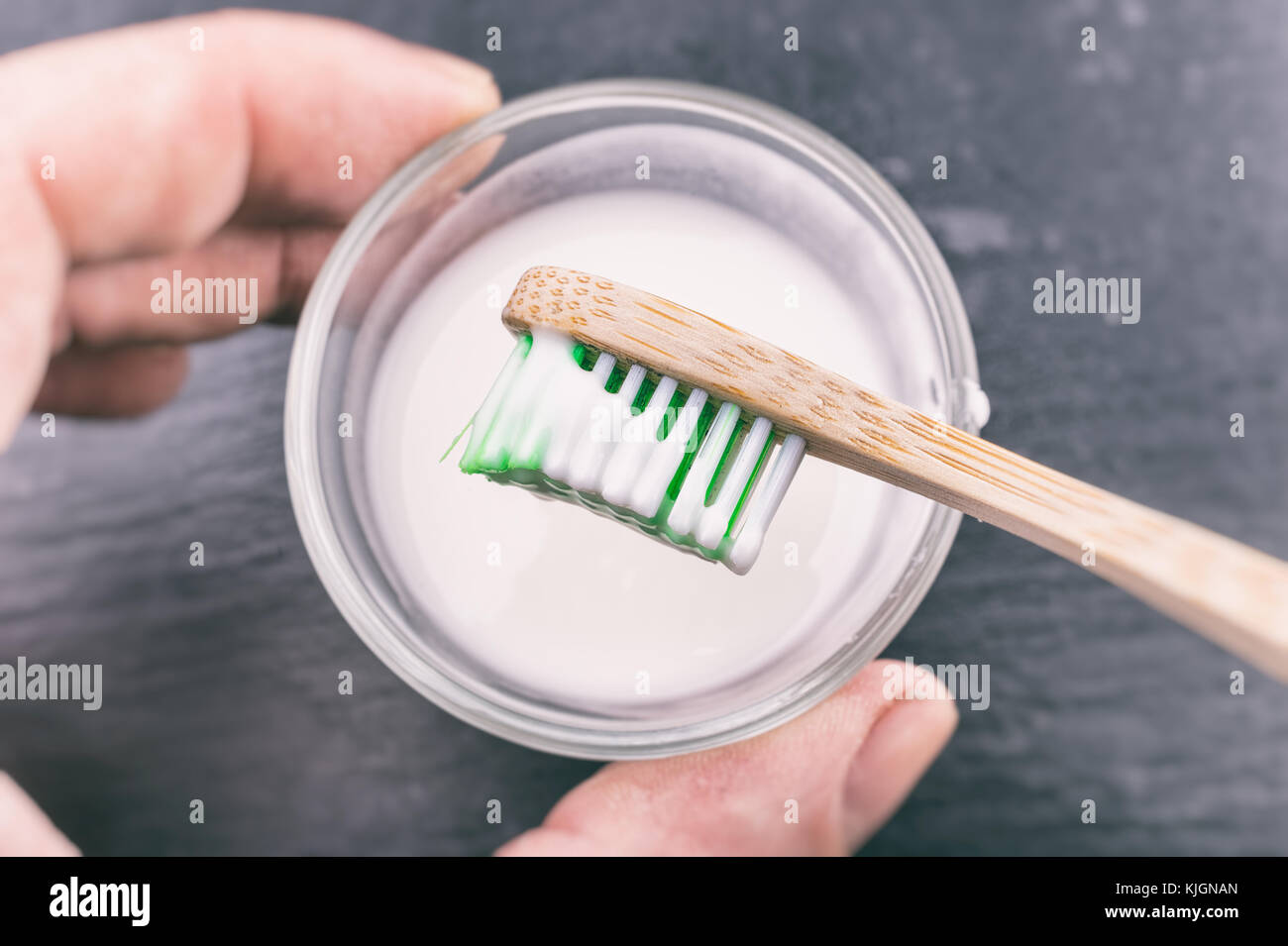 Baking soda paste on a toothbrush Stock Photo - Alamy