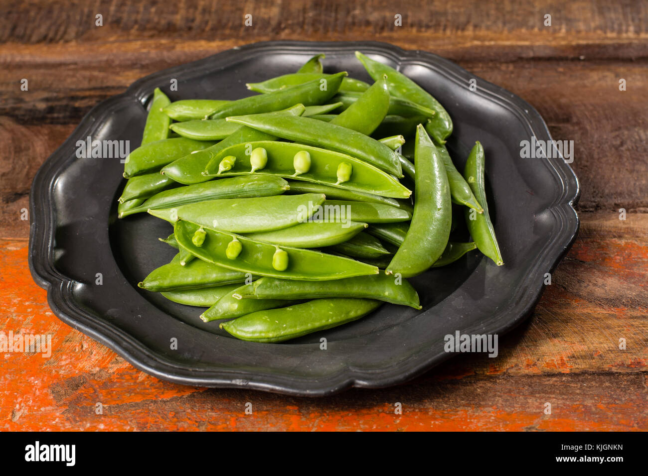 Fresh green sweet pea beans close up Stock Photo - Alamy