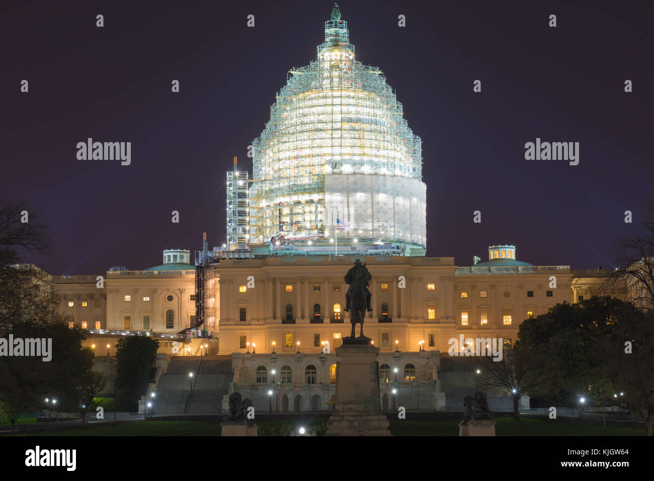 The Capitol Building of the United States of America at night with the ...